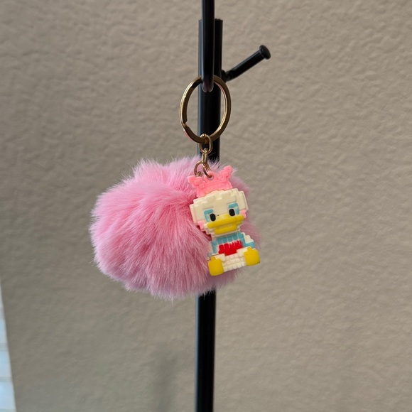 Boutique | Accessories | Pixel Daisy Duck Pink Fluff Ball Keychain ...